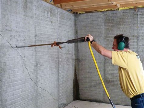 Repairing Straightening Tilting Foundation Walls By Authorized Foundation Repair Contractors
