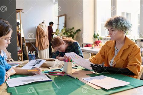 Diverse Group Of Girls In Tailoring Class At Table Stock Image Image