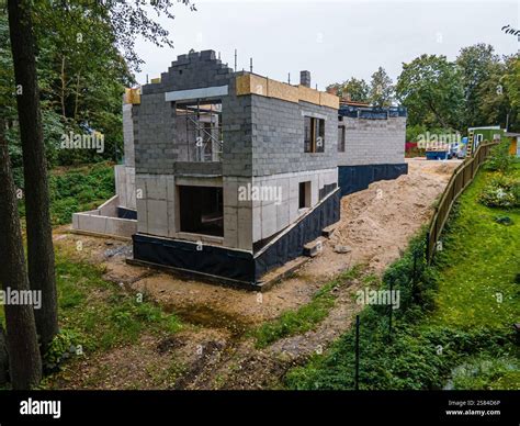 Concrete And Cinder Block Structure With Scaffolding And Unfinished