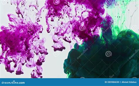Abstract Powerful Vivid Color Ink Drops Spreading In Water Texture