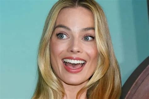 Margo Wearing A Pink Mini Dress With Ribbons On The Chest Appeared In Beverly Hills With Her