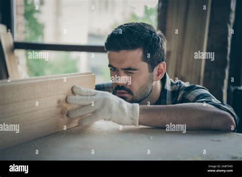 Close Up Photo Of Focused Confident Serious Man Measuring Distance