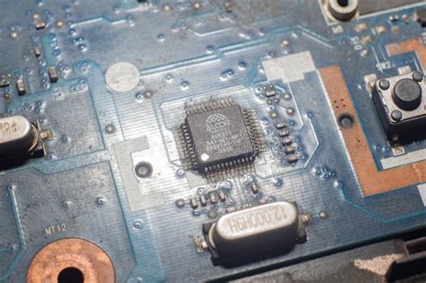 Close Up Macro Shot Of Electronic Factory Machine At Work Printed Circuit Board Being Assembled