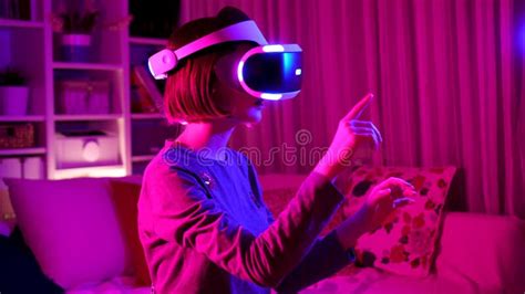 Pretty Teenage Girl Wearing Virtual Reality Headset In A Dark Room Stock Video Video Of