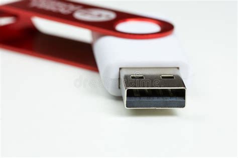 Close Up View Of A White Usb Flash Drive Connector With Red Cap Stock