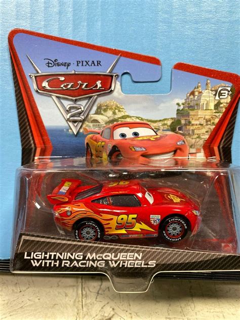 Mattel Disney Pixar Cars 2 Lightning Mcqueen With Racing Wheels