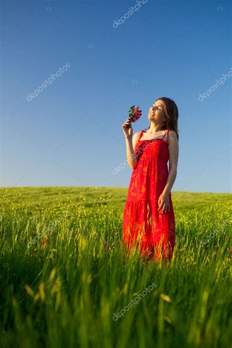 Happy Woman With Flowers Stock Photo Ikostudio