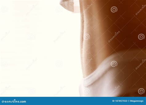Beautiful Slim Female Belly Part Of The Body Of A Girl In White