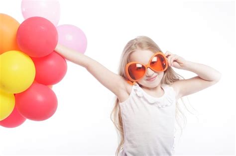 Premium Photo Girl With Balloons And Orange Sunglasses