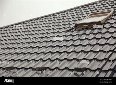 Metal Tile Roof With Skylight Window During Heavy Rain Closeup Stock