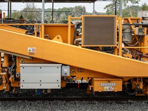 Premium Photo The Ballast Tamping Machine For Working To Maintain The