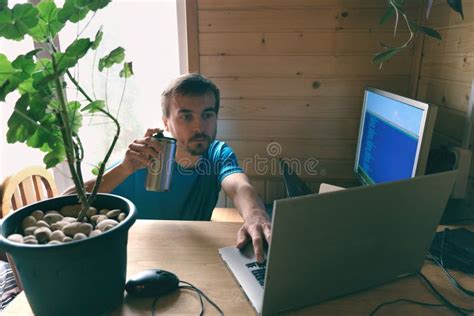 Freelance Programmer Drinks And Write Code Work From Home In