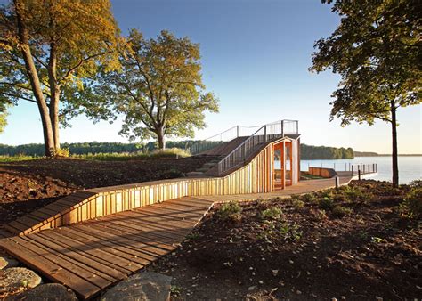 wooden viewing platform looks out over latvia s river daugava