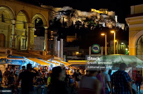 Nightlife On Monastiraki Square Acropolis Of Athens On The Background