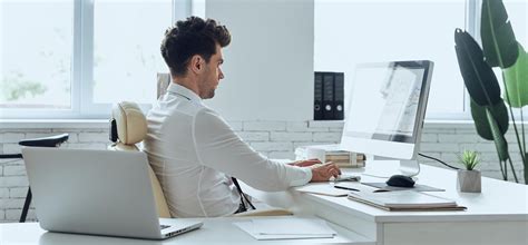 Premium Photo Concentrated Man In Shirt And Tie Using Computer While