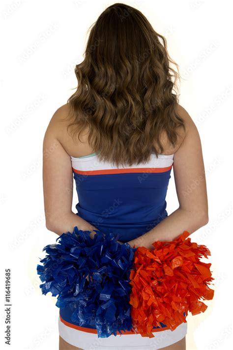 Teen Cheerleader Standing Back Side View With A White Background Stock
