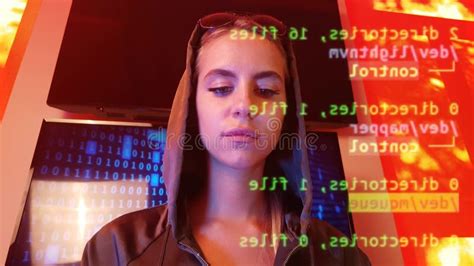 Female Hacker Looking At Screen While Working On System Code Computer