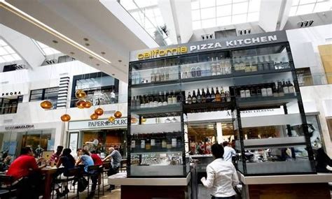 California Pizza Kitchen Tries A New Look Rustic Rough Organic