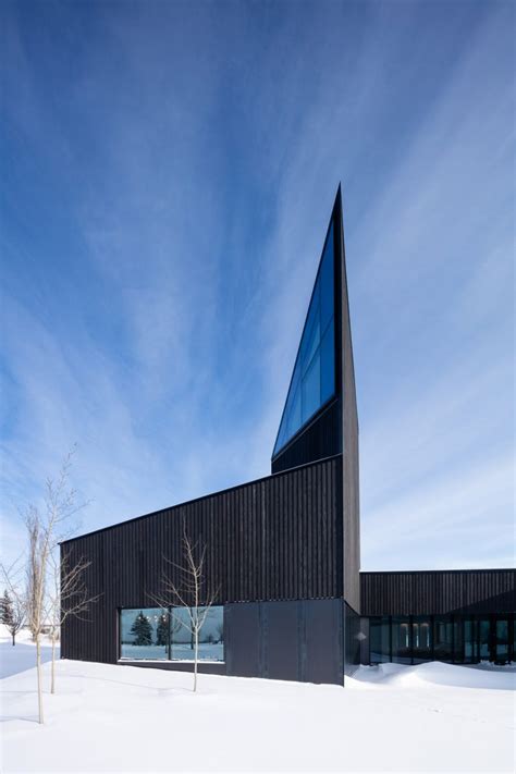 Shape Architecture Tops Centre For Remembrance With Angular Tower