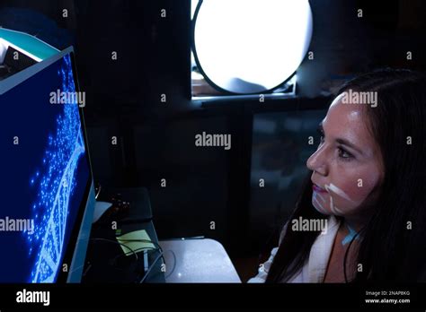Woman Doctor Works On Human Dna Analysis With Computer Simulation Aids To Examine Human Genetic