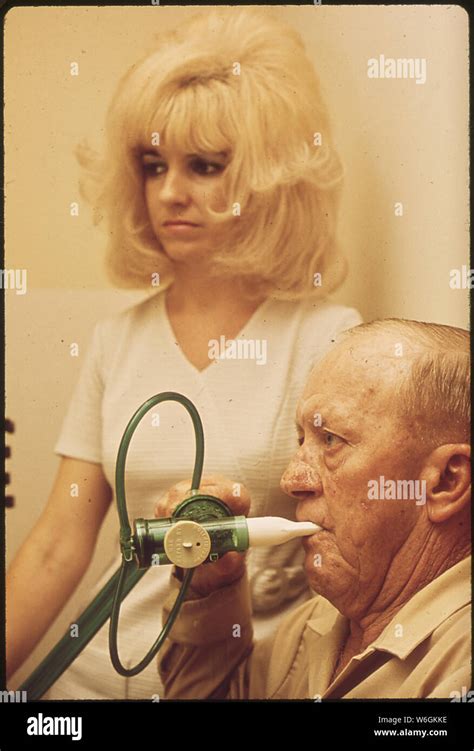 Former Machinist Mr Wilbur Shuff Uses A Lung Function Testing Machine