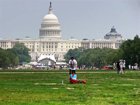 People Are Resting Near United States Capitol Building In Washington Dc