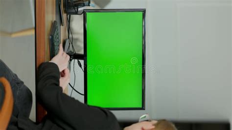 Woman Working On Desktop Computer With Green Screen Mock Up In Modern Office Stock Footage