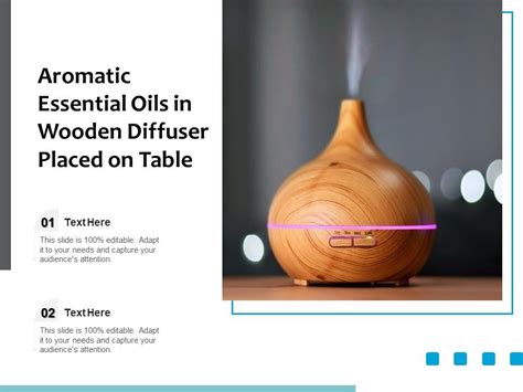 aromatic essential oils in wooden diffuser placed on table ppt