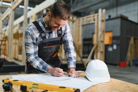 Construction Of Modular Houses An Architect On A Construction Site