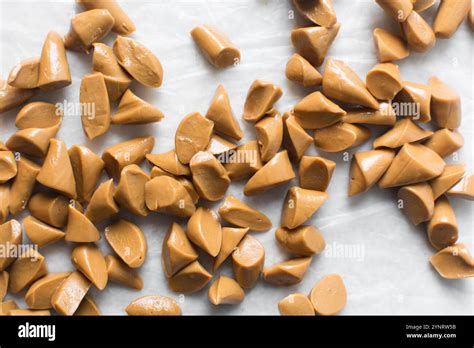 Overhead View Of Iloka Candy On Parchment Paper Cooked Condensed Milk Candy Nigerian Iloka