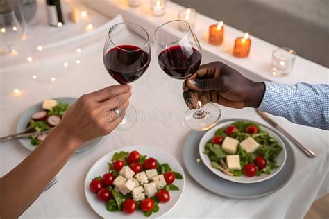 Romantic Dining Setting With Clinking Wine Glasses Stock Illustration