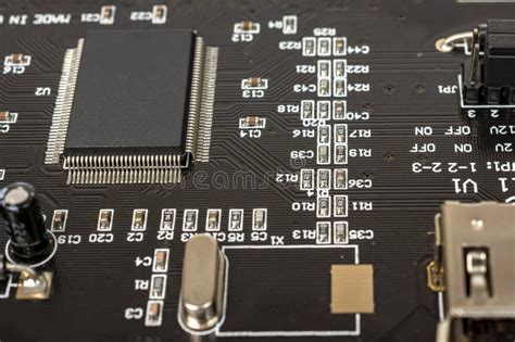 Black Printed Circuit Board With Microcircuits And Radio Components Electronics Stock Image