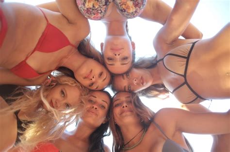 Premium Photo Low Angle View Of The Young Girls In Bikinis On A Sandy