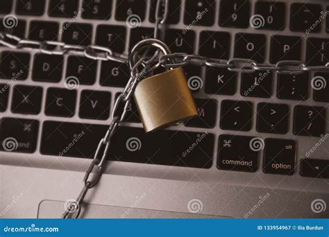 Cyber Safety Concept Locked Chain On Laptop Computer Stock Image