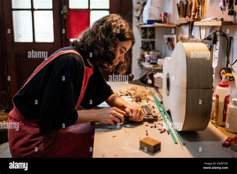 Woman Luthier Making Guitars In Her Musical Instrument Workshop Stock Photo Alamy