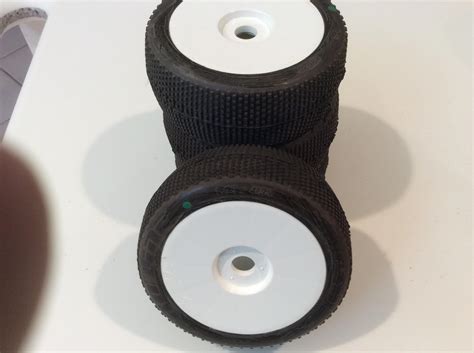 new set of proline m3 holeshot 1 8 buggy tires mounted on white wheels