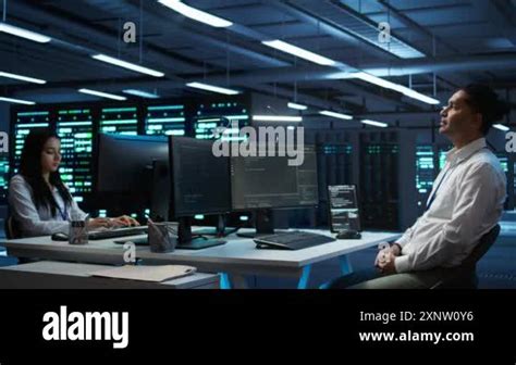 admin in data center using augmented reality technology to ensure system can handle networking