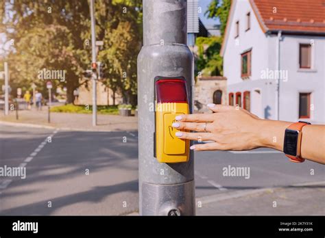 Aware Passenger Presses The Traffic Light Control Button To Safely Cross The Street Accident