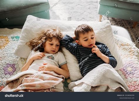 Brother And Sister Sleeping On Bed Over 3 867 Royalty Free Licensable