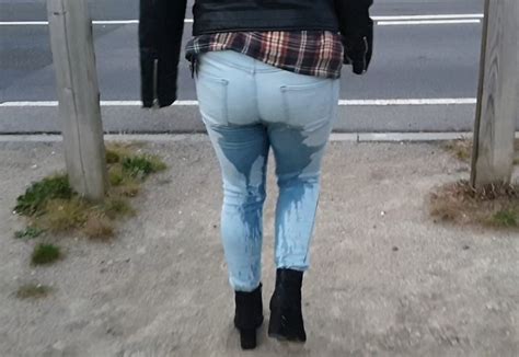 Public Wetting And Rewetting Tight Blue Jeans And Leather Jacket