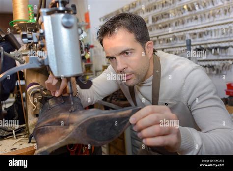 Fixing A Boot Stock Photo Alamy