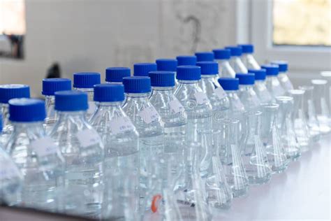 Laboratory Equipment Laboratory Storage Bottles With Blue Polypropylene Cap On White Table