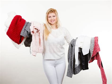 Woman Holding Big Piles Of Clothing Stock Photo Image Of Pile Blonde