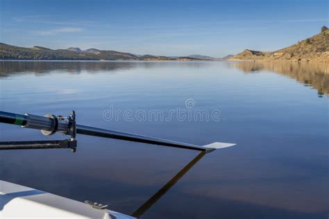 Hatchet Oar And A Rowing Shell On A Shore Of Carter Lake In Northern