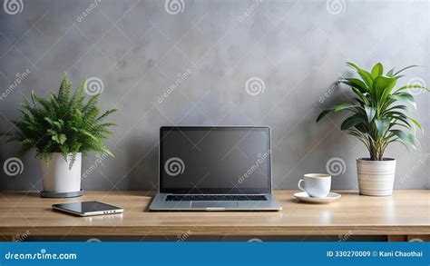 A Minimalist Desk With A Sleek Laptop And An Ergonomic Mouse For Gaming