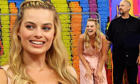 Margot Robbie Laughs As She Joins David Ayer Promoting Suicide Squad On