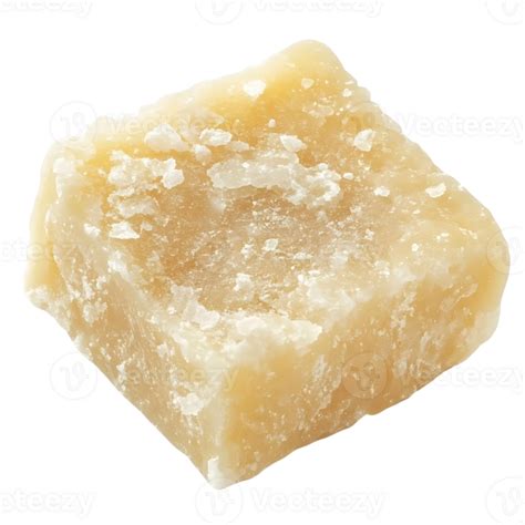 A Chunk Of Parmesan Cheese With A Gritty Texture And Visible