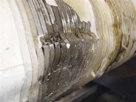 Photograph Of The Radial Buckling That Occurred On The Inside Windings Download Scientific