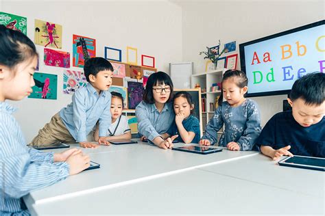 Students Learning In Classroom By Stocksy Contributor Maahoo Stocksy