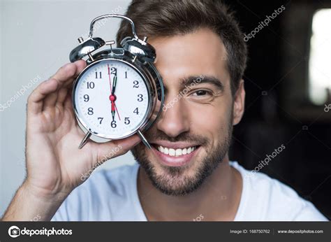 Man With Alarm Clock Stock Photo By AllaSerebrina 168750762